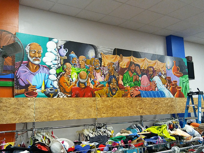 Art adorns the walls above the clothing racks, adding cultural depth to this community space that's about much more than just bargains.