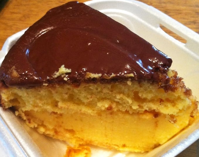 A slice of heaven with chocolate on top. Because after conquering mountains of seafood, your sweet tooth deserves its own victory lap.