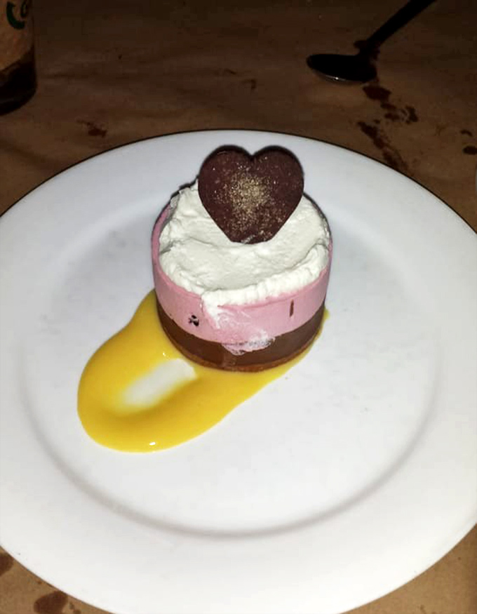Dessert that understands the importance of presentation. That heart-shaped chocolate isn't just cute&mdash;it's a love letter to your taste buds.