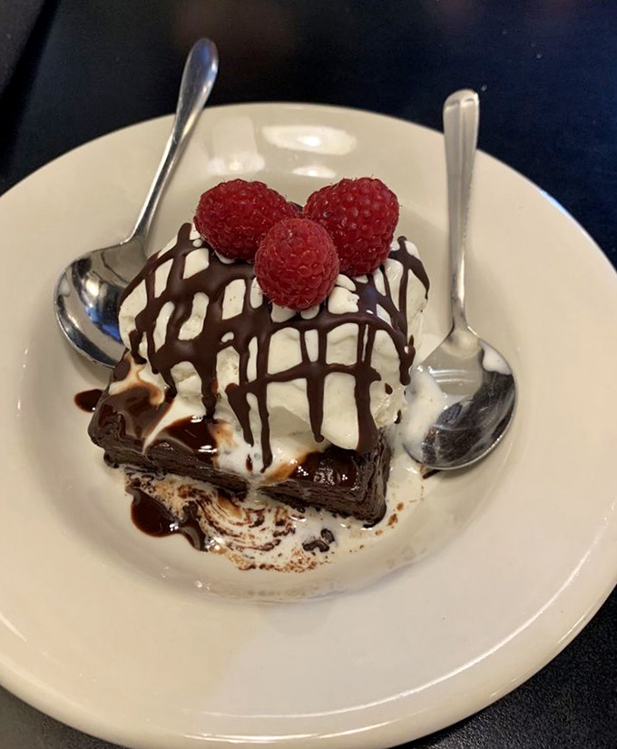 Chocolate decadence with raspberry ambassadors&mdash;the kind of dessert that makes you consider starting with the final course next time.