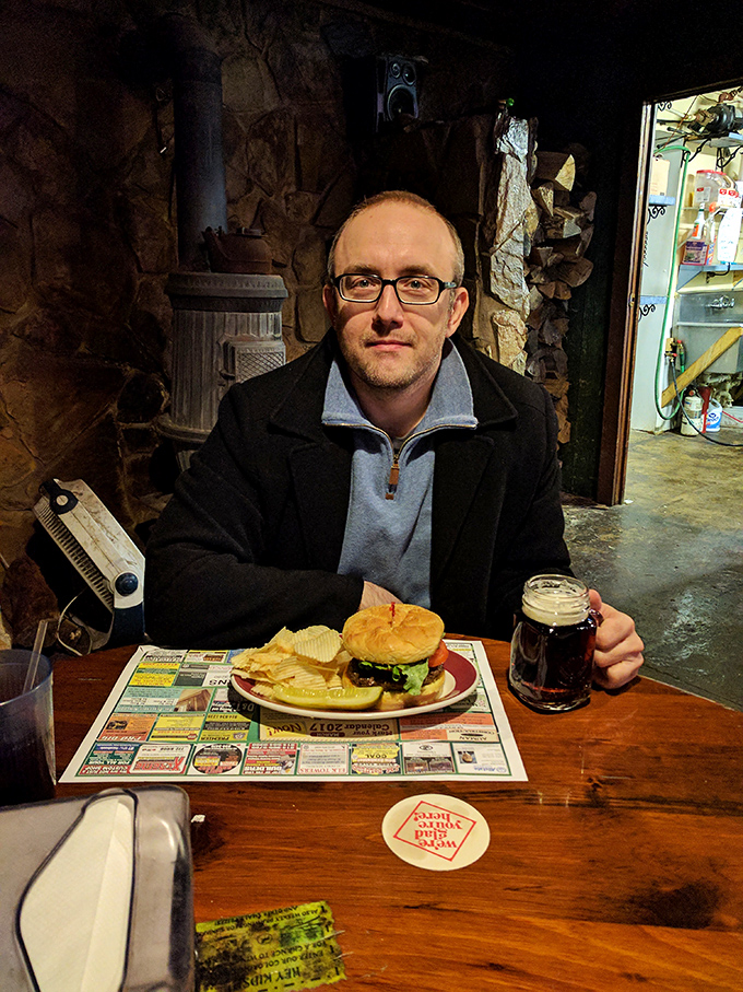 The rustic stone walls create the perfect backdrop for a hearty meal. This is where hunger meets satisfaction over burgers and beer.