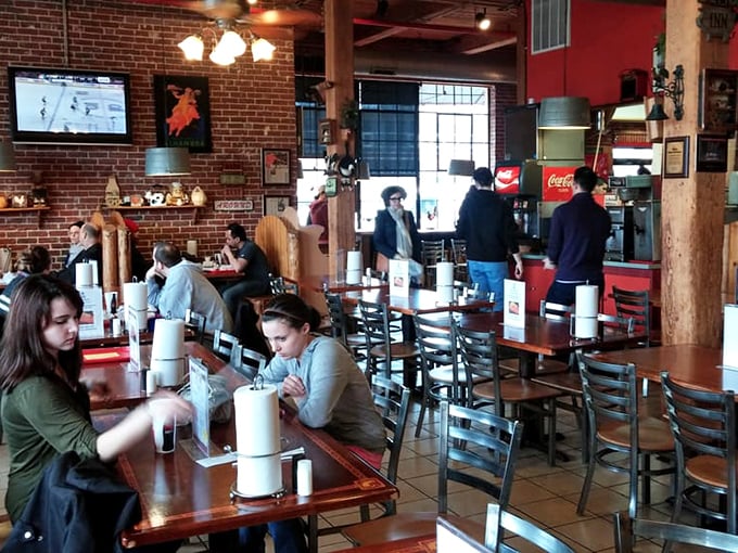 The true measure of great barbecue: a dining room full of focused eaters, conversation temporarily suspended while everyone pays proper respect to the food.