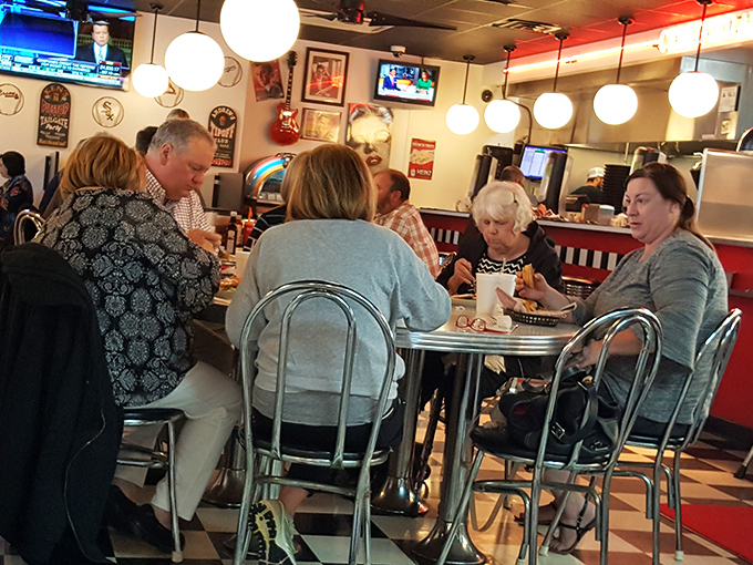 Where strangers become temporary friends united by the universal language of "pass the ketchup" and appreciative sandwich nods.