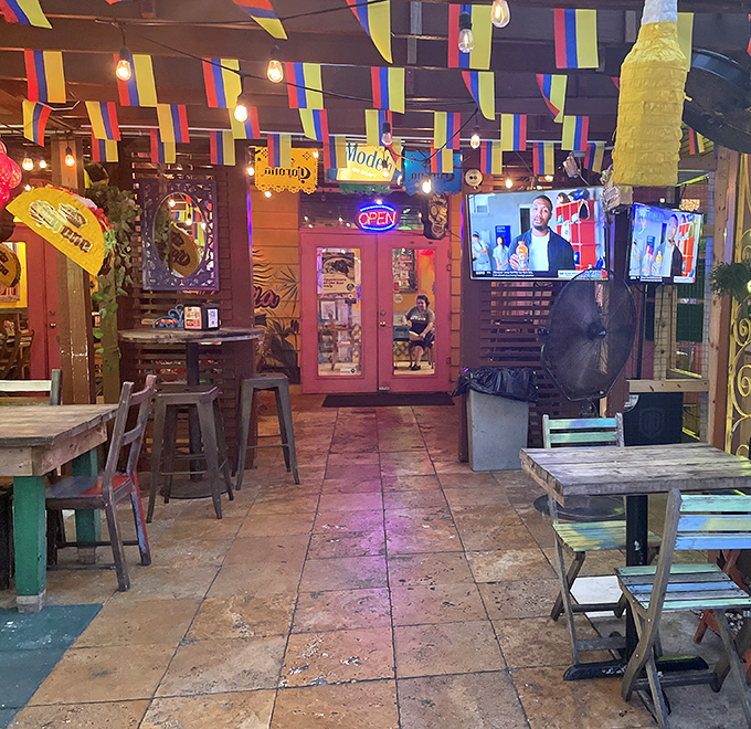 Fiesta flags overhead and character in every corner. The interior's colorful bunting and eclectic decor create an atmosphere that's as flavorful as the food.