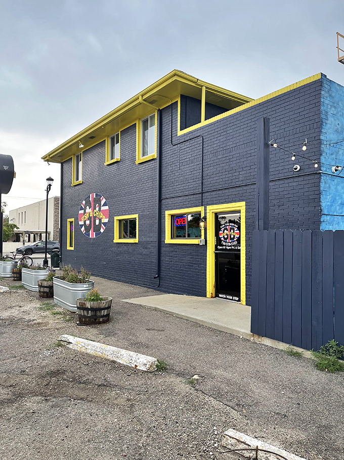 The navy blue exterior with bright yellow trim stands out like a British sailor on shore leave&mdash;impossible to miss and beckoning you inside.