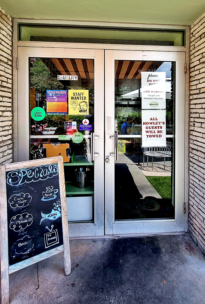 The gateway to gastronomy. This unassuming entrance with its cheeky signage is the portal to some of West Palm Beach's most satisfying meals.