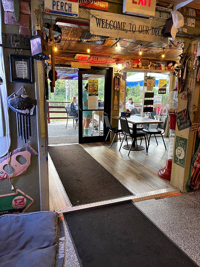 The entrance to the deck beckons like a portal to relaxation&mdash;where the outside world fades away and only good food and river views matter.