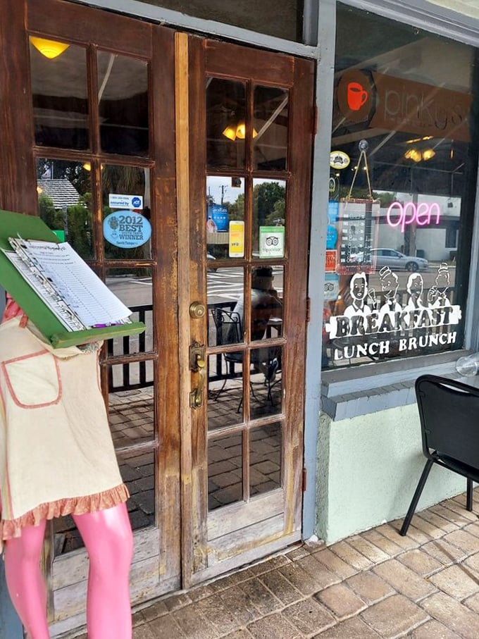 The entrance promises "Breakfast, Lunch, Brunch" but really means "Come in, we'll make everything better." That door leads to happiness.