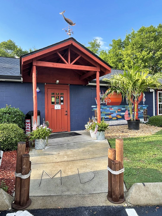 The whale weathervane stands guard over this nautical hideaway, where wooden posts wrapped in rope remind you that yes, you're about to eat really good seafood.