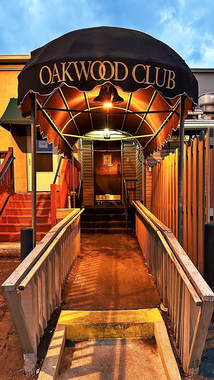 The entrance ramp at night feels like the gateway to a delicious adventure&mdash;follow the golden light to steak nirvana.