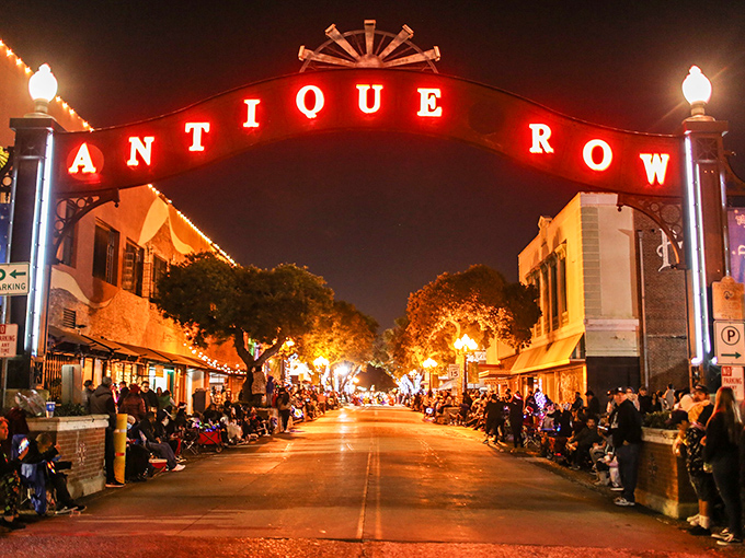 As night falls, Antique Row transforms into a glowing corridor of possibility, where vintage hunting continues well after the sun sets.