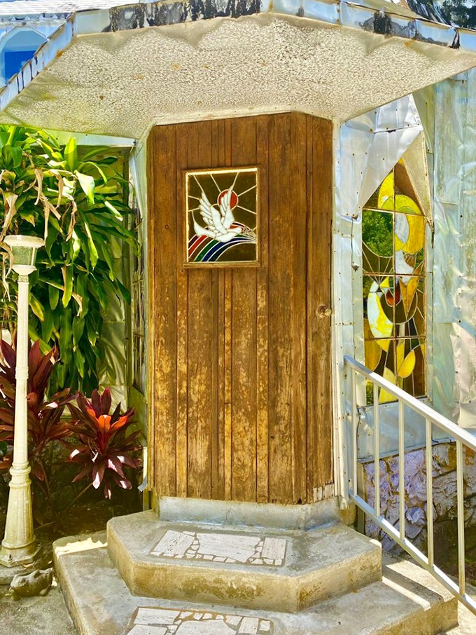 This unassuming doorway with stained glass accents leads visitors back to reality&mdash;though after experiencing the castle, "reality" seems rather dull by comparison.