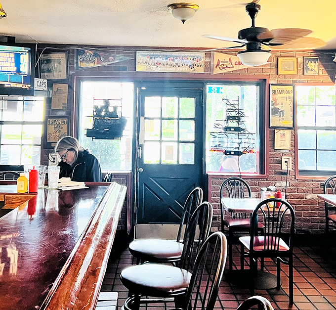 Simple tables, well-worn chairs, and the promise of burger perfection. Sometimes the most unpretentious spaces deliver the most memorable meals.