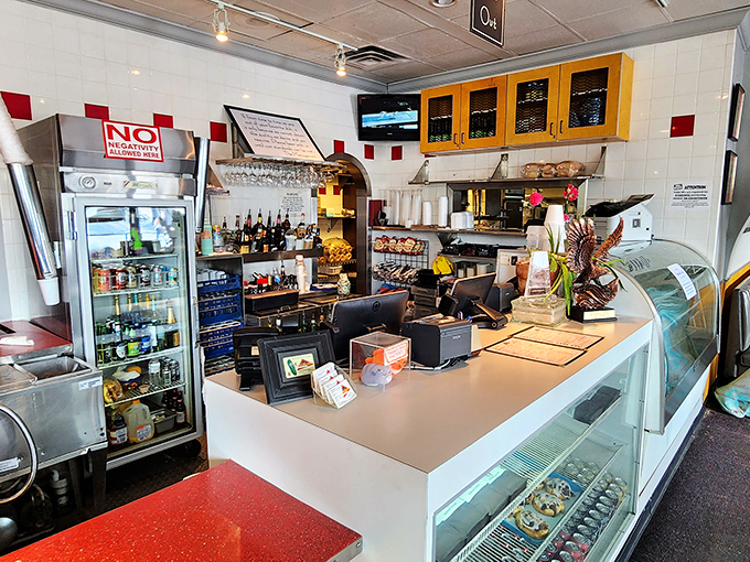 The front counter&mdash;where dreams of pastrami are fulfilled and the display case tempts you with desserts you swore you were too full to consider.