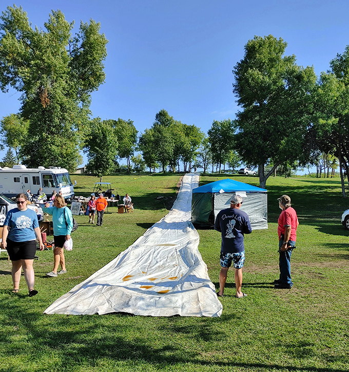 Not your average water slide! This makeshift summer fun setup proves that Shady Hollow offers unexpected entertainment alongside its vintage treasures.