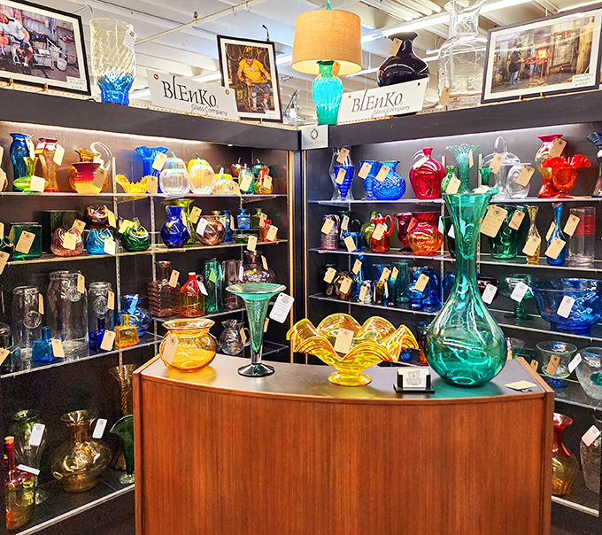 The Blenko glass display creates a kaleidoscope of color that would make a rainbow jealous. Each piece captures light like liquid jewelry.