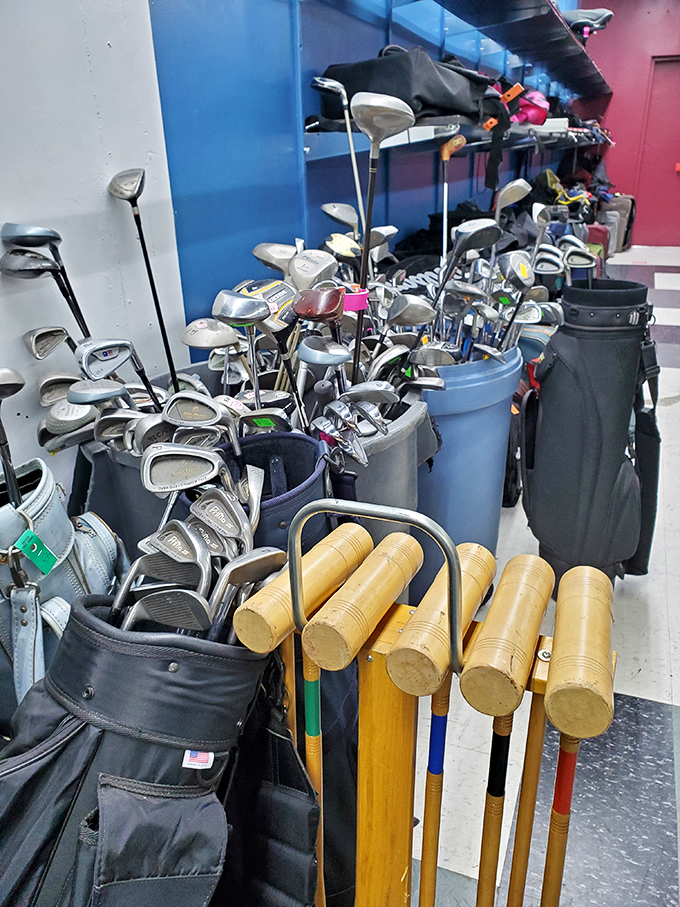 Golf clubs huddled together like old friends at a reunion, each one with tales of perfect drives and spectacular misses.
