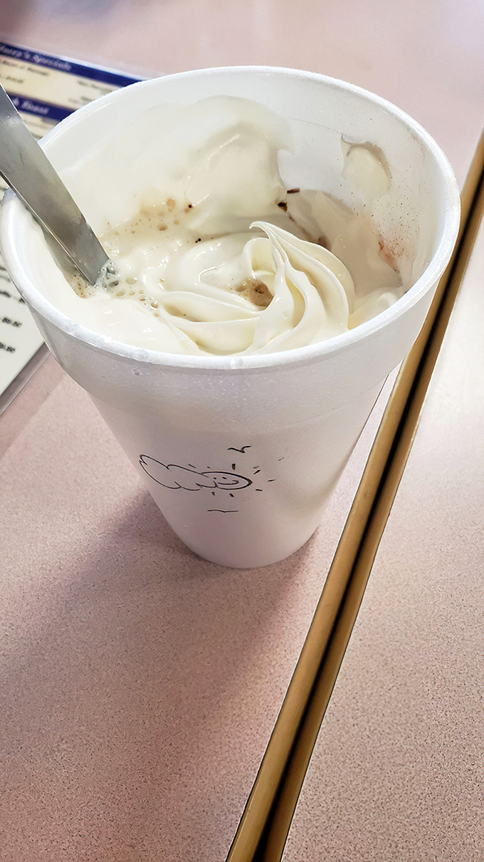 A mountain of whipped cream atop hot chocolate&mdash;because sometimes breakfast should feel like you're getting away with something.