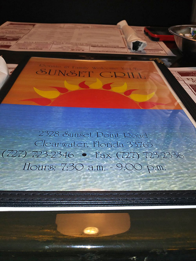 The menu cover reveals all you need to know &ndash; location, hours, and that sunny logo that's become a beacon for breakfast lovers.