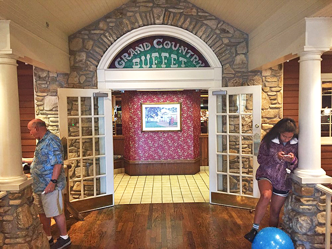 Stone archway entrance that feels like passing through the gates of comfort food heaven. Your diet plan stops here&mdash;abandon all restraint, ye who enter.