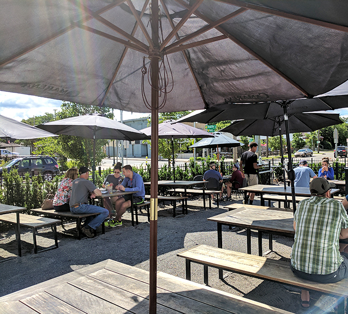 The outdoor dining area: where summer memories are made. Under umbrellas and blue skies, strangers become friends united by their love of great tacos.