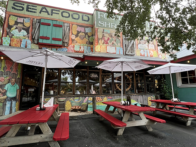 The outdoor seating area &ndash; where picnic tables, umbrellas, and colorful murals create the perfect Florida vibe for enjoying your seafood bounty.