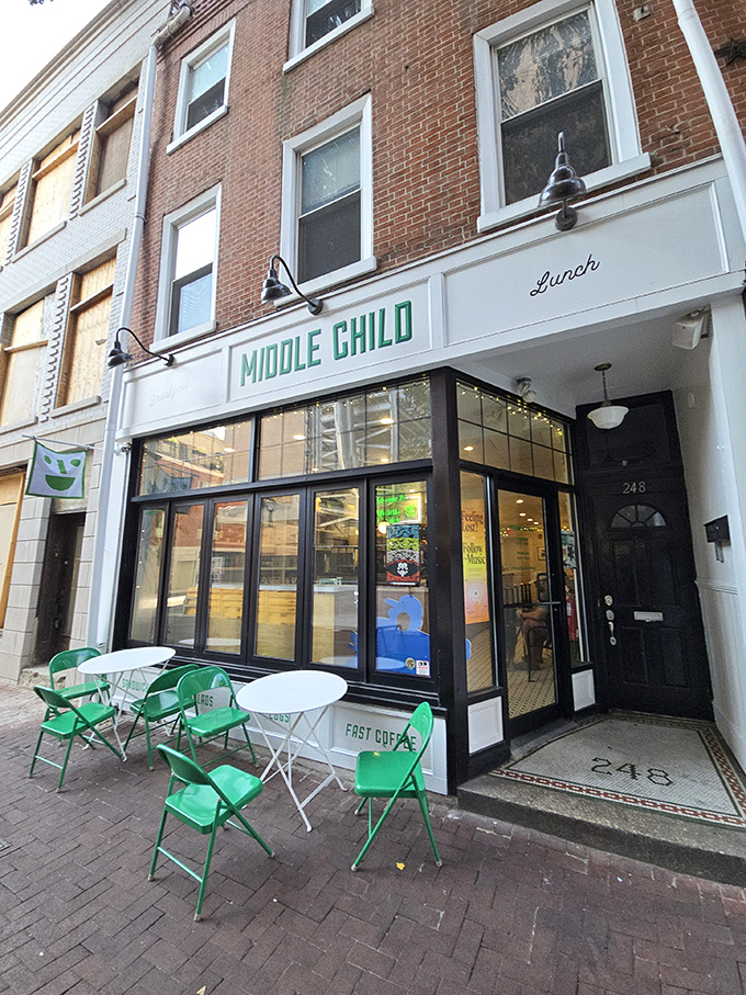 These cheerful green chairs aren't just seating&mdash;they're front-row tickets to Philadelphia's sidewalk theater. Coffee and people-watching: the perfect urban pairing.