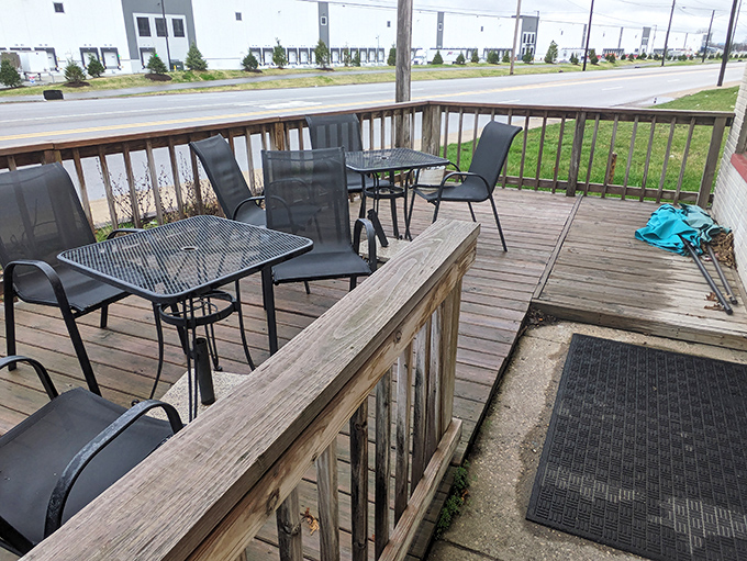 Fresh air pairs perfectly with comfort food. This modest deck says, "Take your time, watch the world go by, no one's rushing you here."