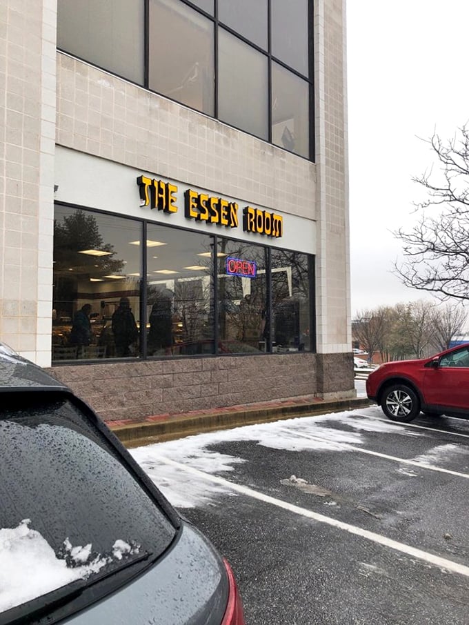 Even on snowy days, The Essen Room's yellow sign glows with promise&mdash;a beacon of warmth for those seeking comfort in carb-laden, meaty salvation.