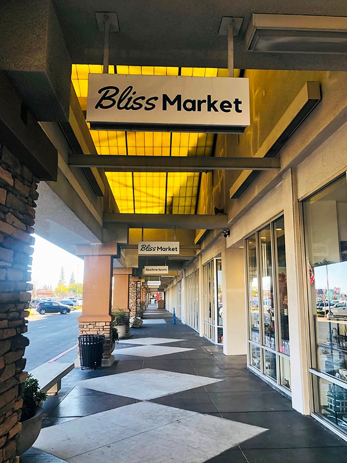 Clean storefront exterior that promises the organized, welcoming experience waiting inside this thrift shopping paradise in Roseville.