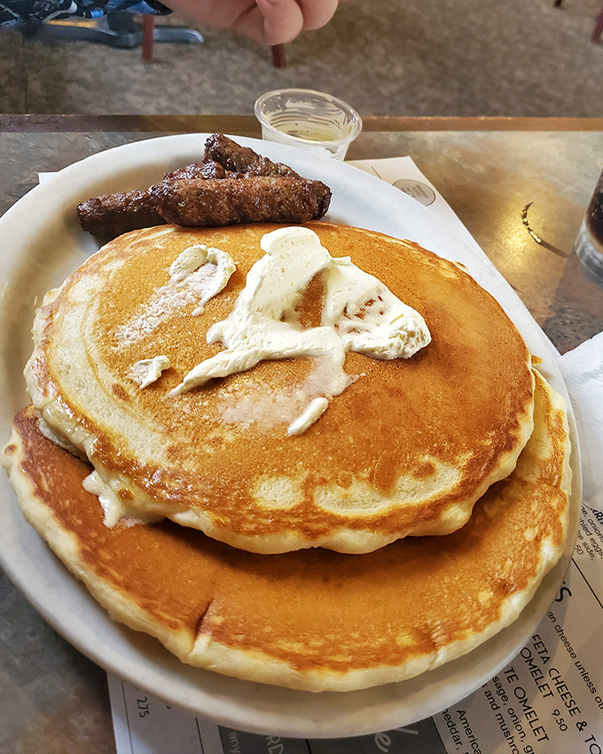 Golden pancakes stacked high with a pat of butter slowly melting down the sides. Add sausage links, and you've got the breakfast of champions.