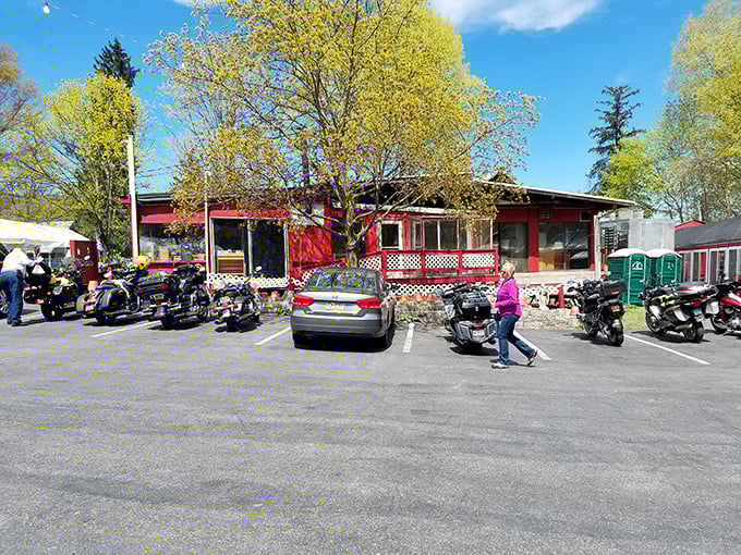 The parking lot tells the real story&mdash;motorcycles, cars, and hungry people converging on this red building like pilgrims to a delicious shrine.