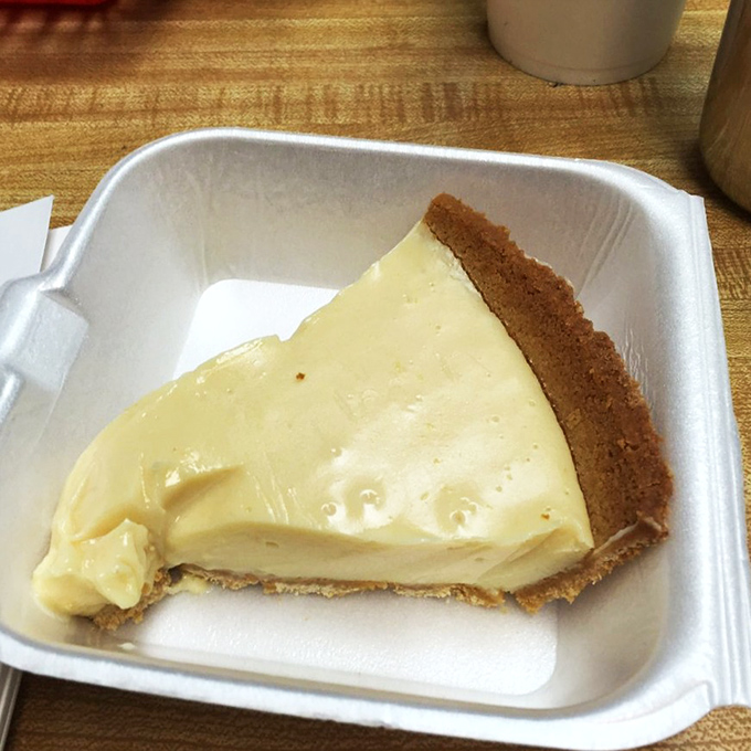 The slice of pie that launched a thousand diets—and broke them just as quickly. That graham cracker crust cradles a filling so smooth it could talk its way out of a speeding ticket.