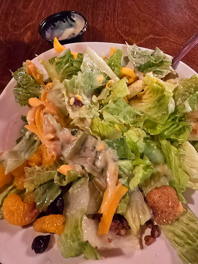 Not just a salad, but a Florida garden party. Those mandarin oranges and cranberries aren't just garnish—they're essential supporting characters.