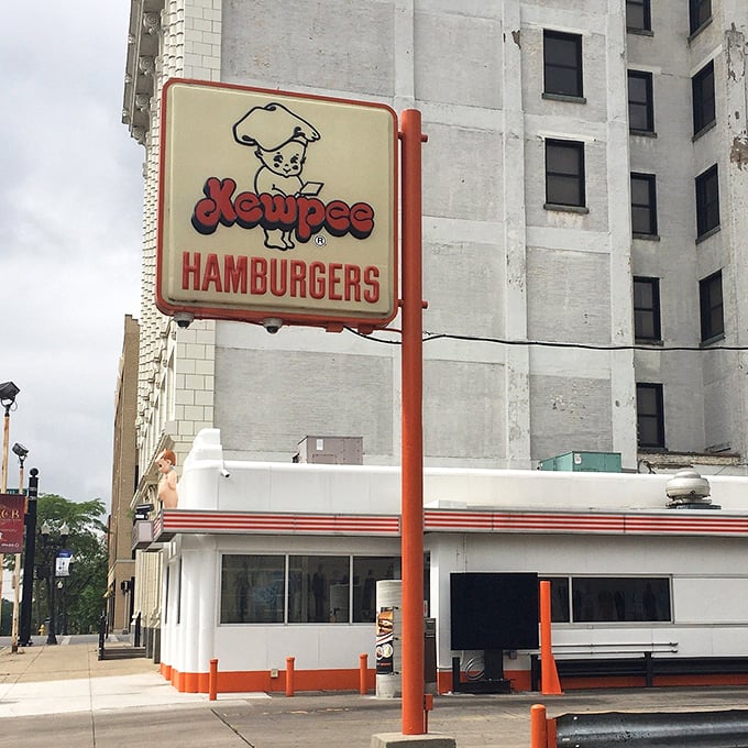 That vintage sign isn't just advertising—it's a beacon of hope for travelers seeking authentic food in a world of culinary pretenders.