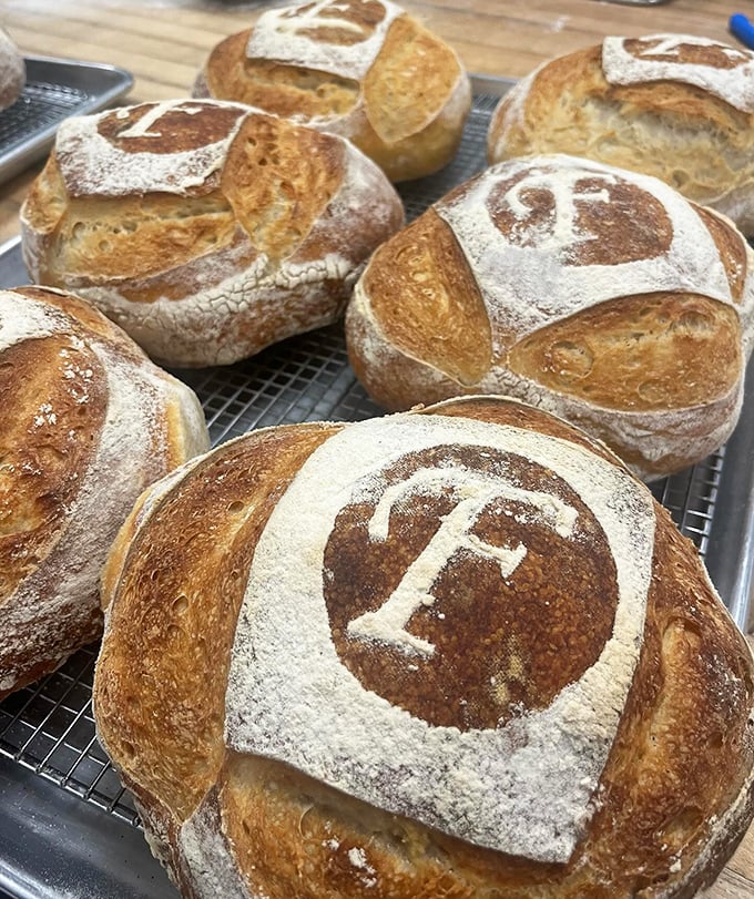 Sourdough loaves branded with an "F" that stands for "Finally, bread worth breaking your keto diet for."