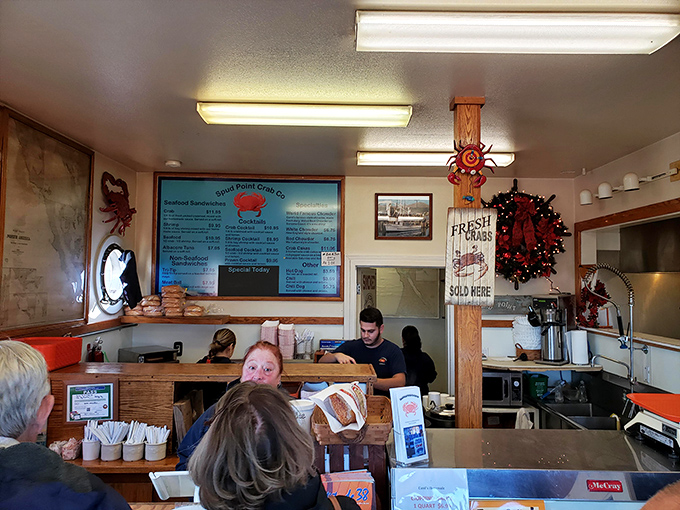 Where seafood dreams come true&mdash;staff working behind the counter, ready to deliver oceanic treasures to eager seafood pilgrims.