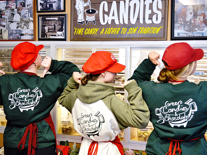 The next generation of candy crusaders! These young apprentices in their matching caps stand ready to carry on a delicious Arkansas tradition.