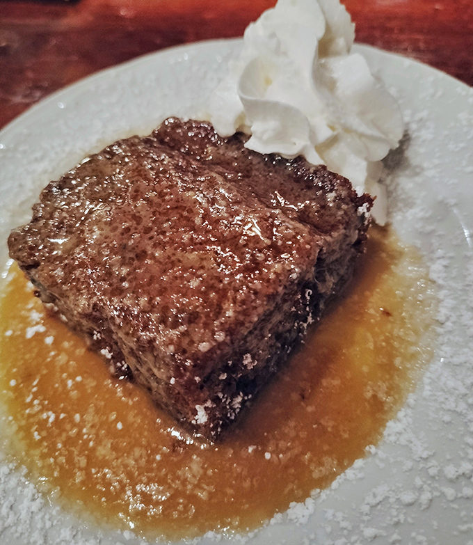 Sticky toffee pudding swimming in caramel sauce &ndash; the dessert equivalent of a warm hug from someone who truly understands you.