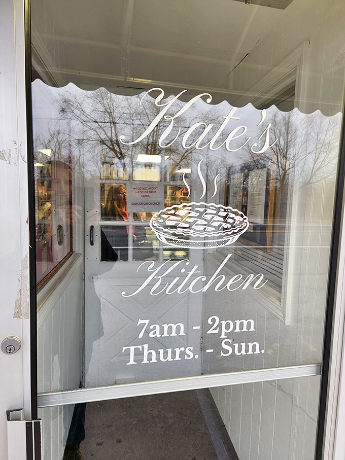The window sign with its pie illustration tells you everything you need to know: this place takes pie seriously, and so should you.