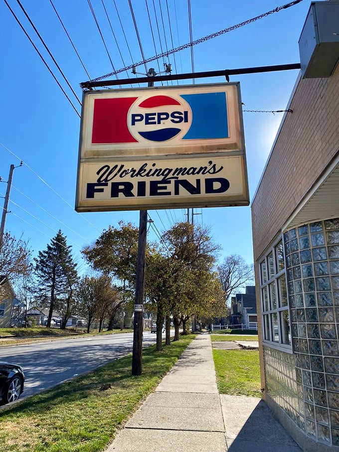 The vintage Pepsi sign stands as a landmark for hungry travelers. Like a lighthouse guiding ships to safe harbor, it beckons burger enthusiasts from miles around.