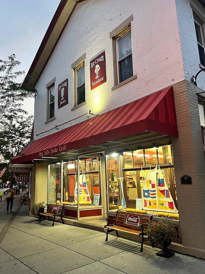 As evening falls, Big Ed's glows like a beacon of comfort on Vermilion's main street, drawing in hungry travelers like moths to a delicious flame.