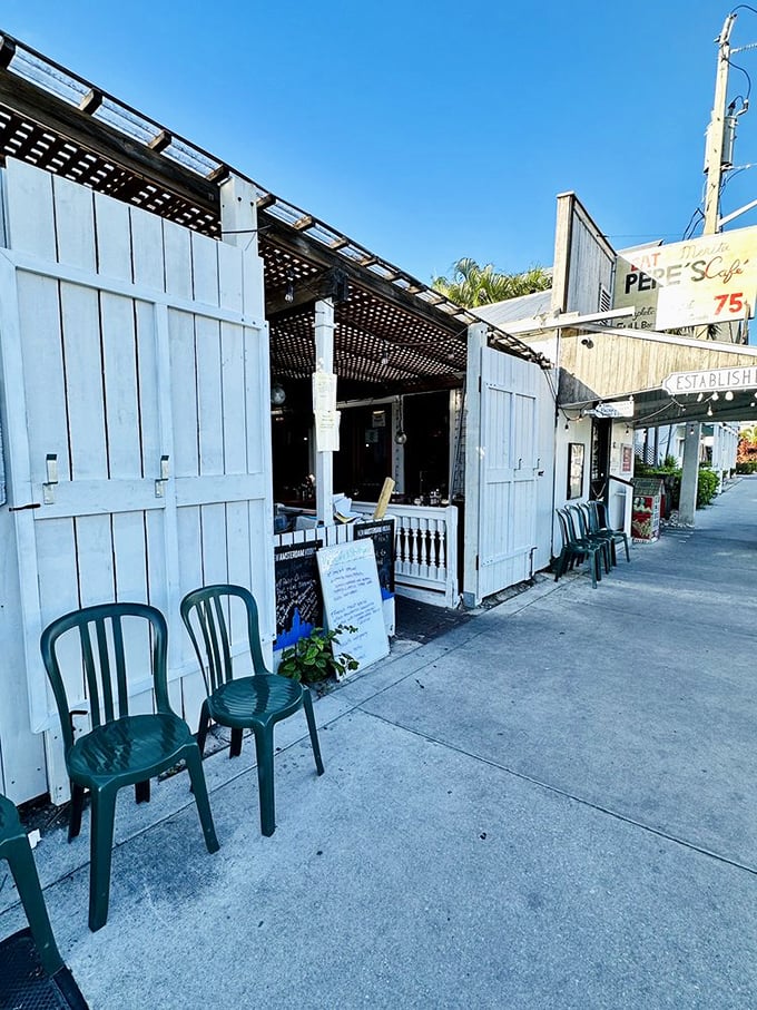 Simple white walls and green chairs outside&mdash;no pretense needed when what's inside has been perfected over generations.