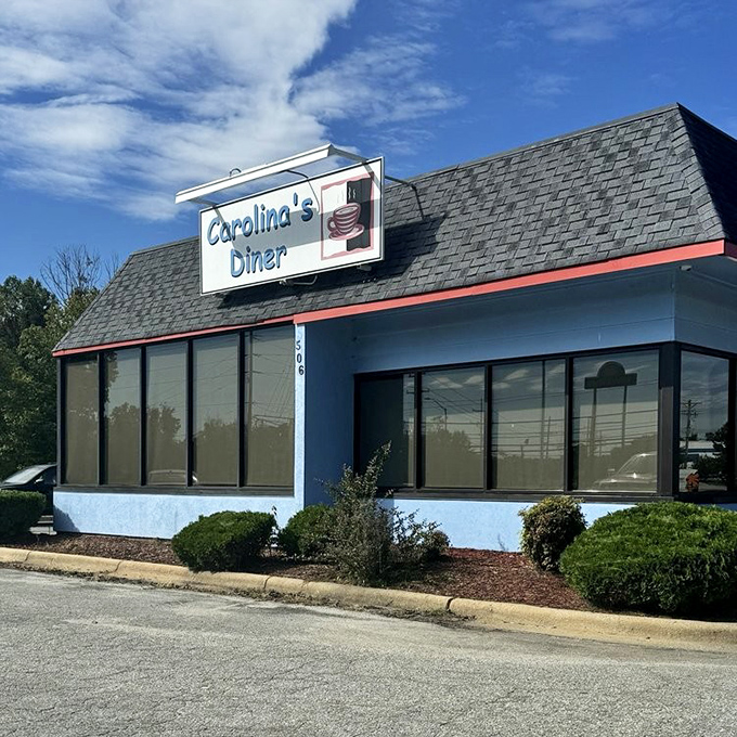 Carolina's Diner doesn't just serve food&mdash;it serves memories with a side of nostalgia under that iconic blue and white facade.