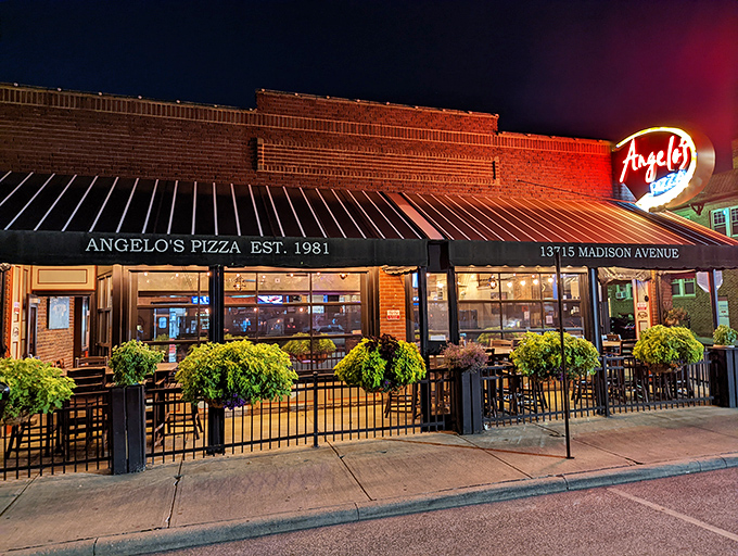 At night, Angelo's glows like a pizza lighthouse, guiding hungry souls safely to shore through a sea of lesser dining options.
