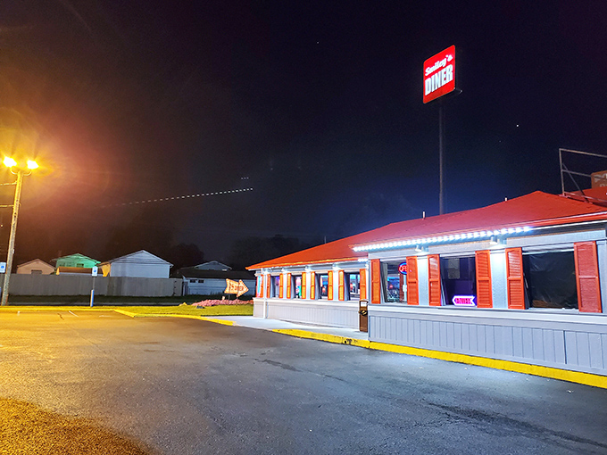 At night, Smiley's red roof glows like a lighthouse for the hungry, guiding travelers toward breakfast served all day.