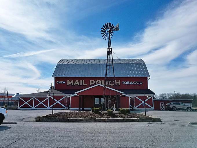 A classic American barn silhouette against the sky, complete with windmill. This isn't just a restaurant&mdash;it's a heartland landmark.