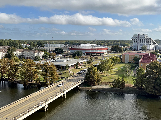 This aerial view reveals Monroe's harmonious relationship with the Ouachita River, the lifeblood of a city that proves affordable living doesn't mean sacrificing beauty.