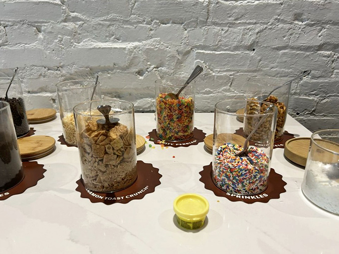 The topping bar offers crunchy, colorful customization options &ndash; because the only thing better than chocolate is chocolate wearing sprinkles and cookie bits.