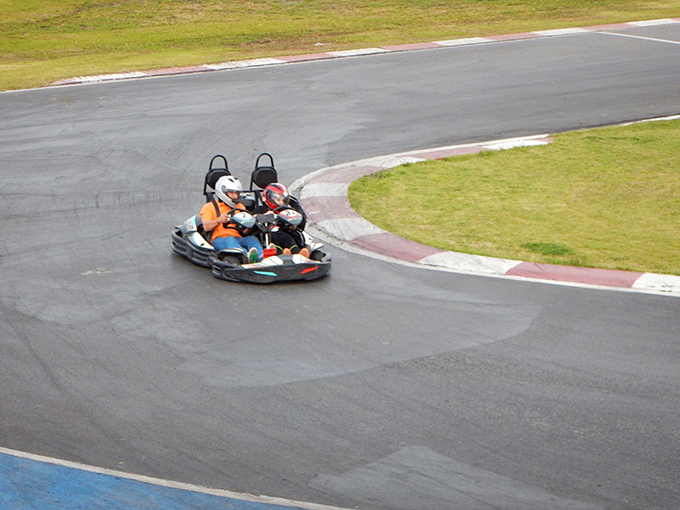 Mastering the racing line through a perfect corner – a fleeting moment of grace that feels like solving the universe's most thrilling puzzle.